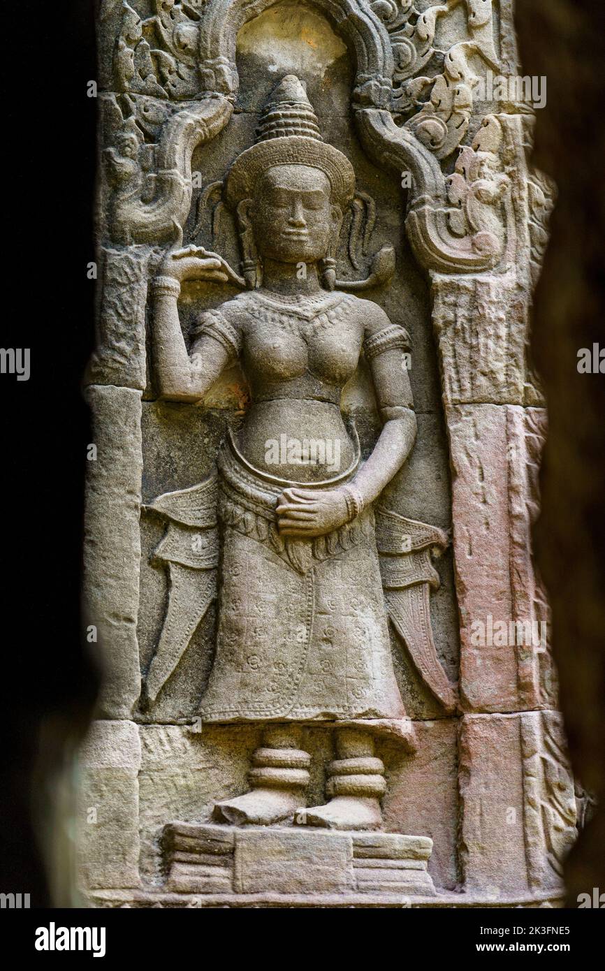 Cambodia. Siem Reap. The archaeological park of Angkor. A bas relief sculpture of Devata at ...