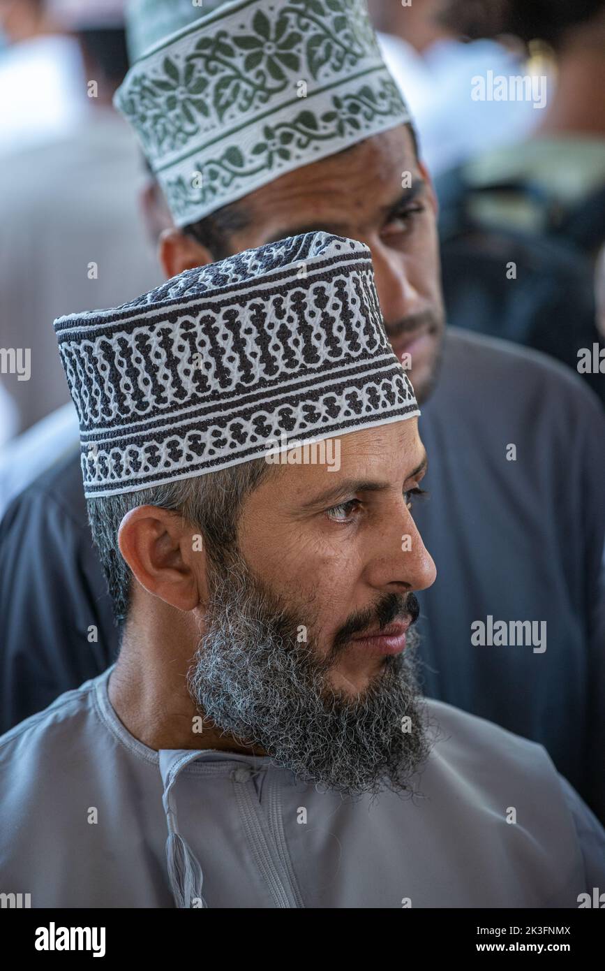 Adult bearded man with kuma (omani traditional round hat, at friday ...