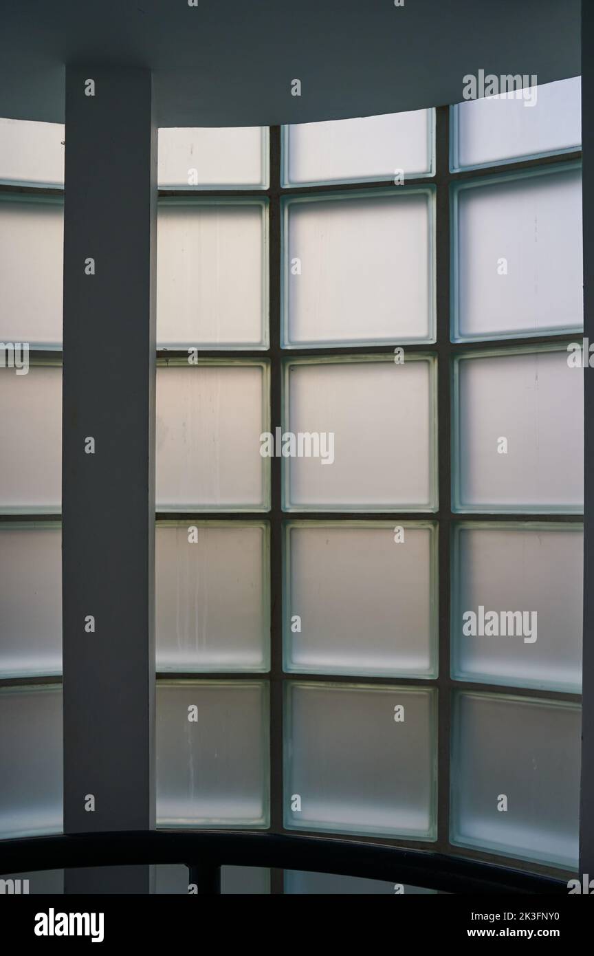 Interior of building looking at opaque of curved window constructed ...