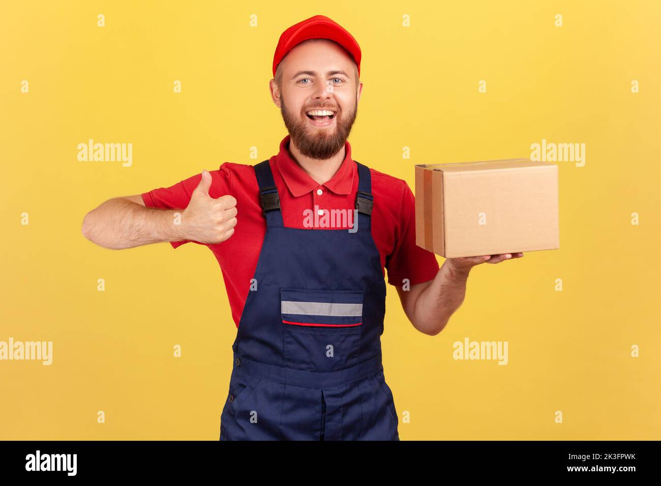 Cargo transportation, delivery service. Smiling courier man in uniform ...