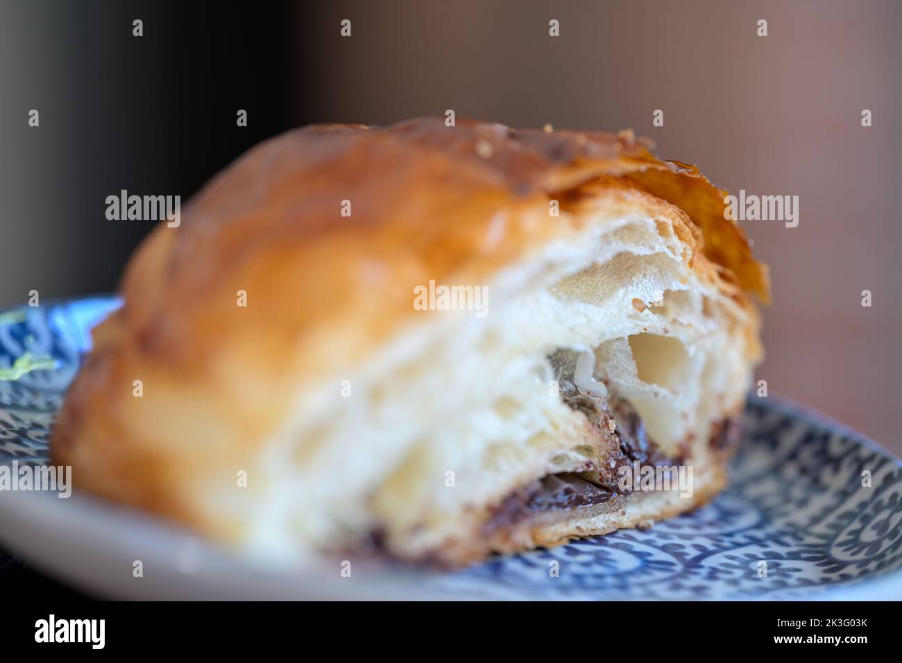 Pain au Chocolat is an extremely popular Viennoiserie sweet roll Stock ...