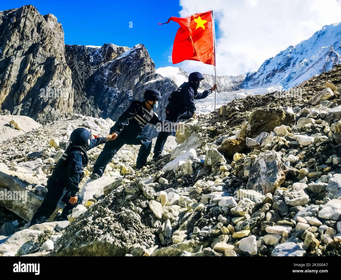 YILI, CHINA - SEPTEMBER 26, 2022 - Chinese policemen patrol the border ...