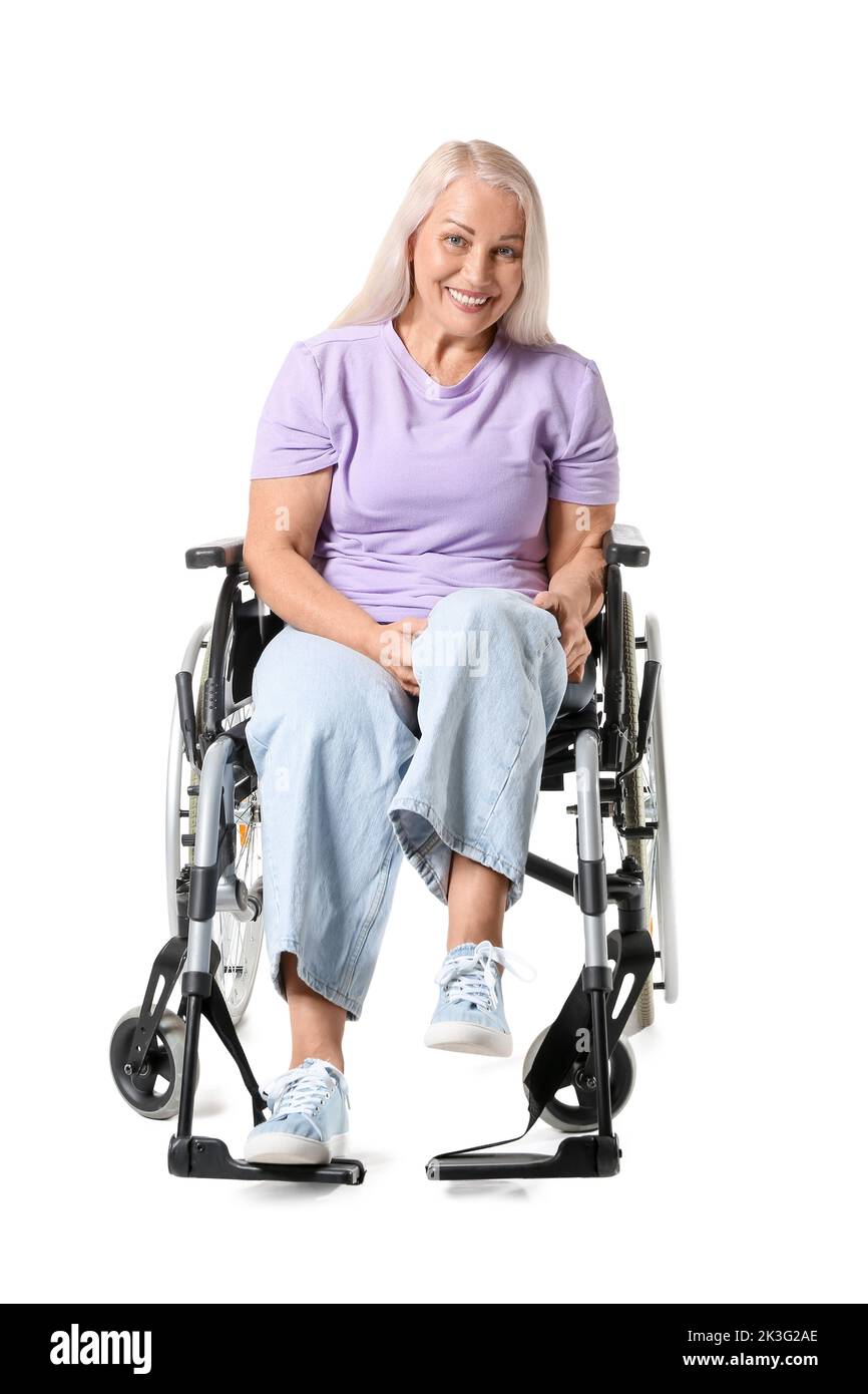 Mature woman in wheelchair isolated on white Stock Photo - Alamy