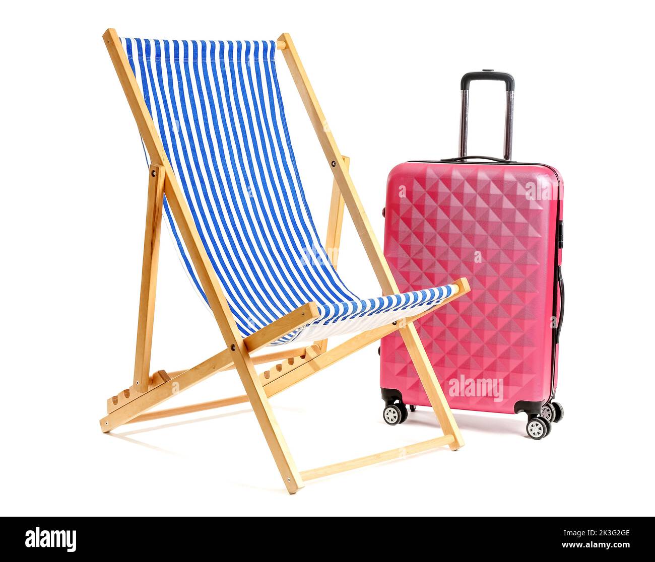 Beach deck chair and suitcase isolated on white Stock Photo - Alamy