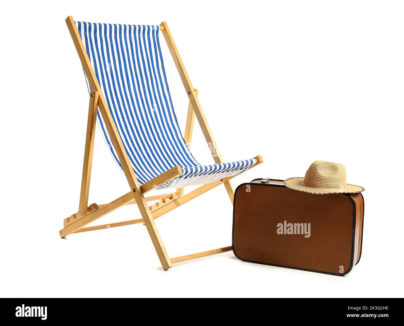 Beach deck chair and suitcase isolated on white Stock Photo - Alamy