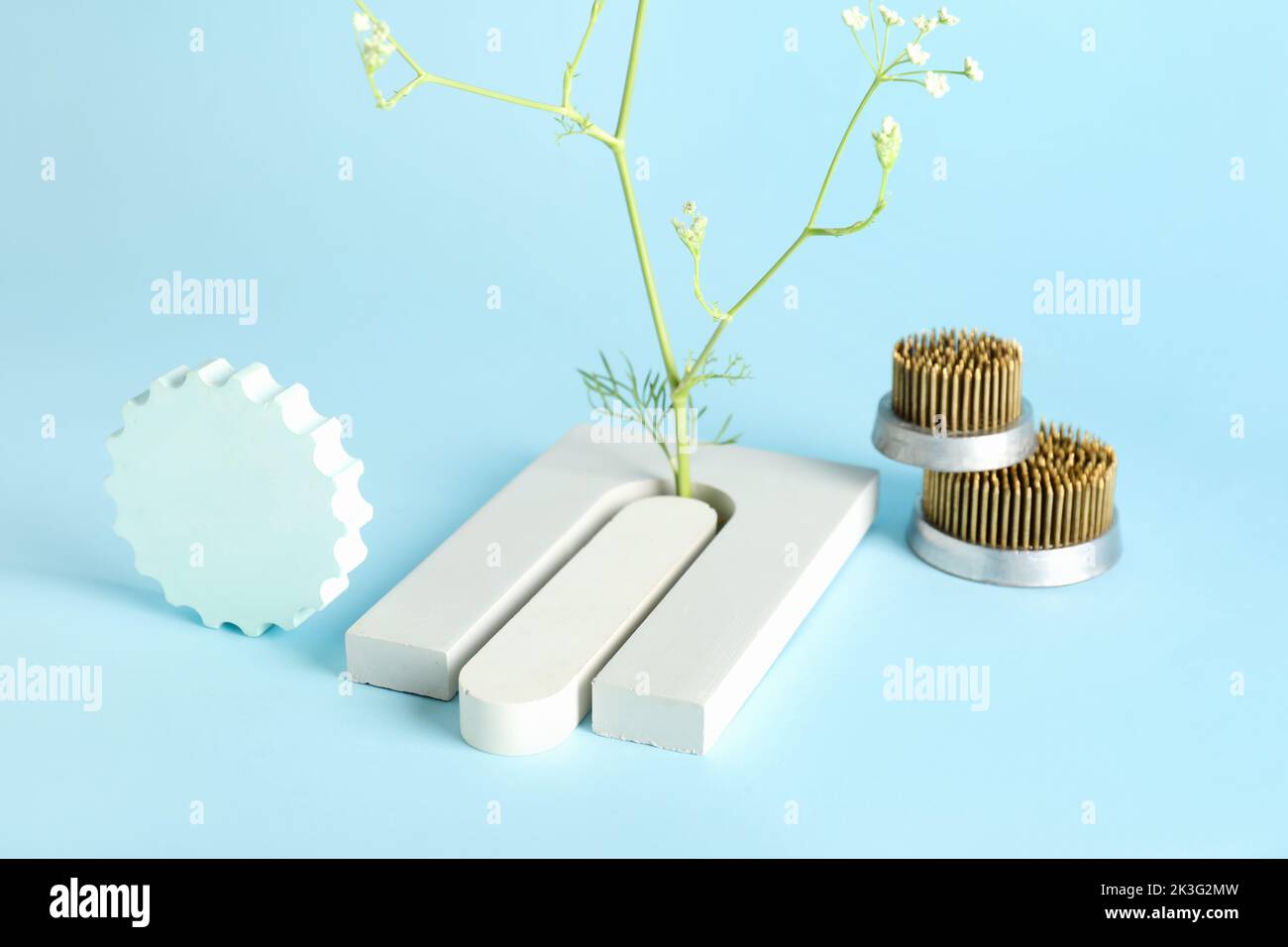 Kenzans for ikebana with flowers and decorative podiums on blue ...