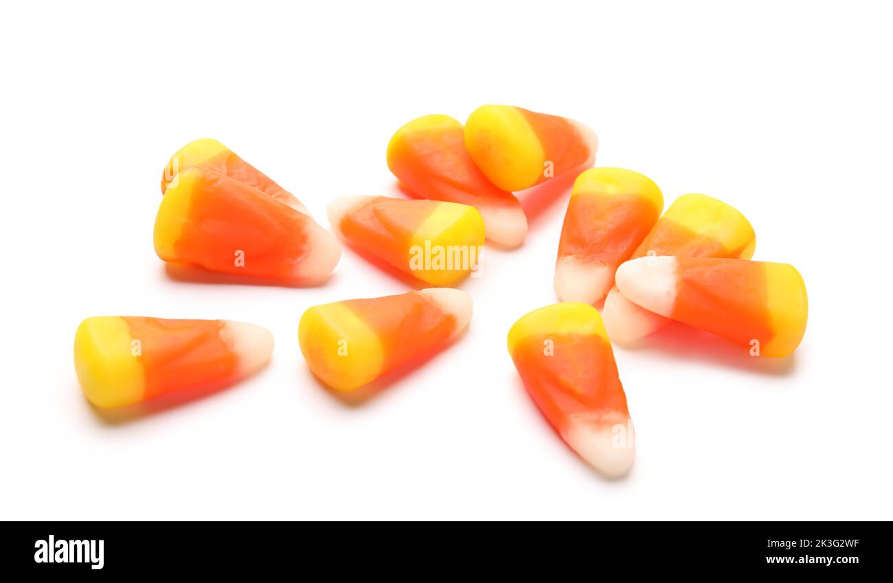 Halloween candy corns on white background Stock Photo - Alamy