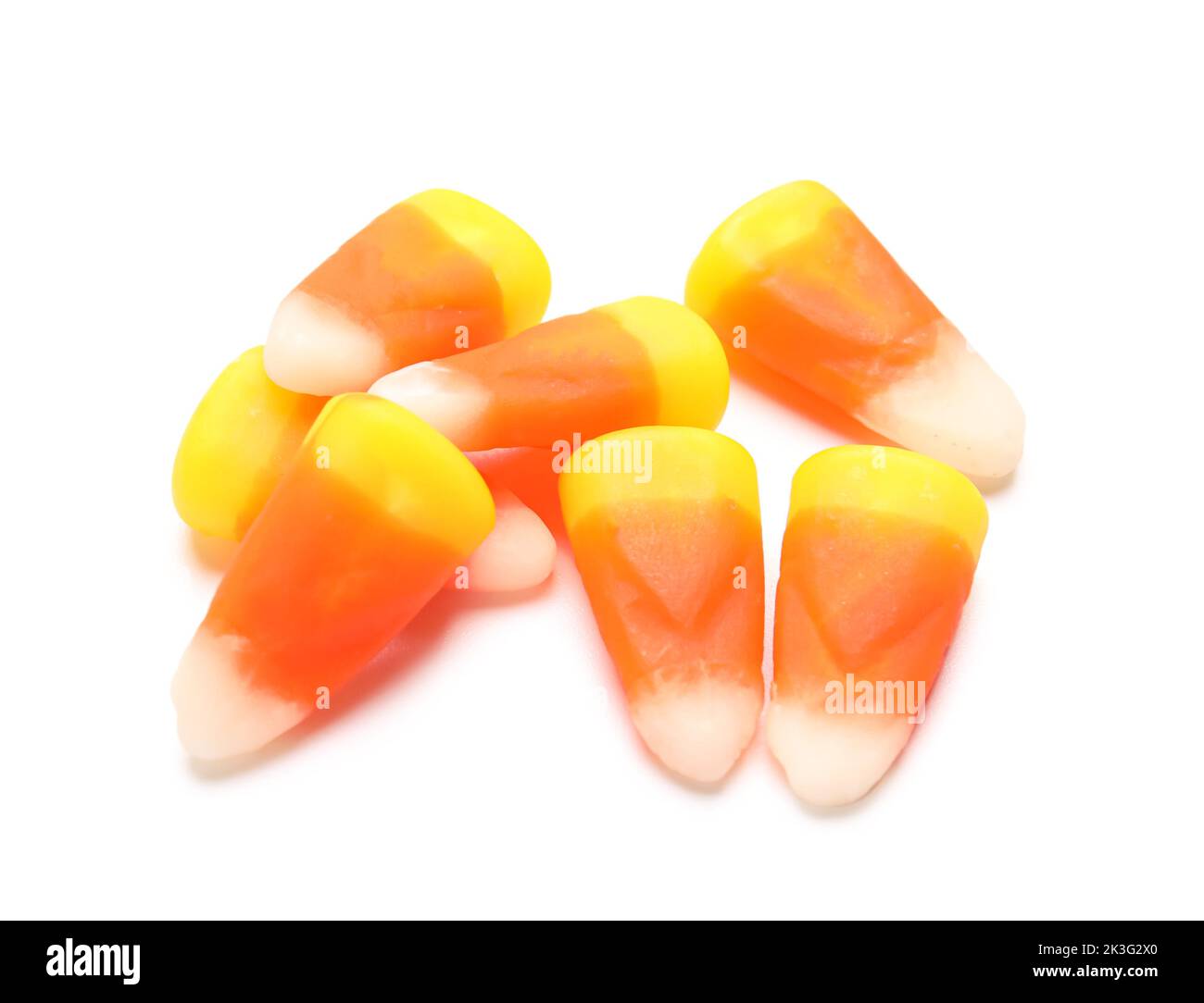 Halloween candy corns on white background Stock Photo - Alamy