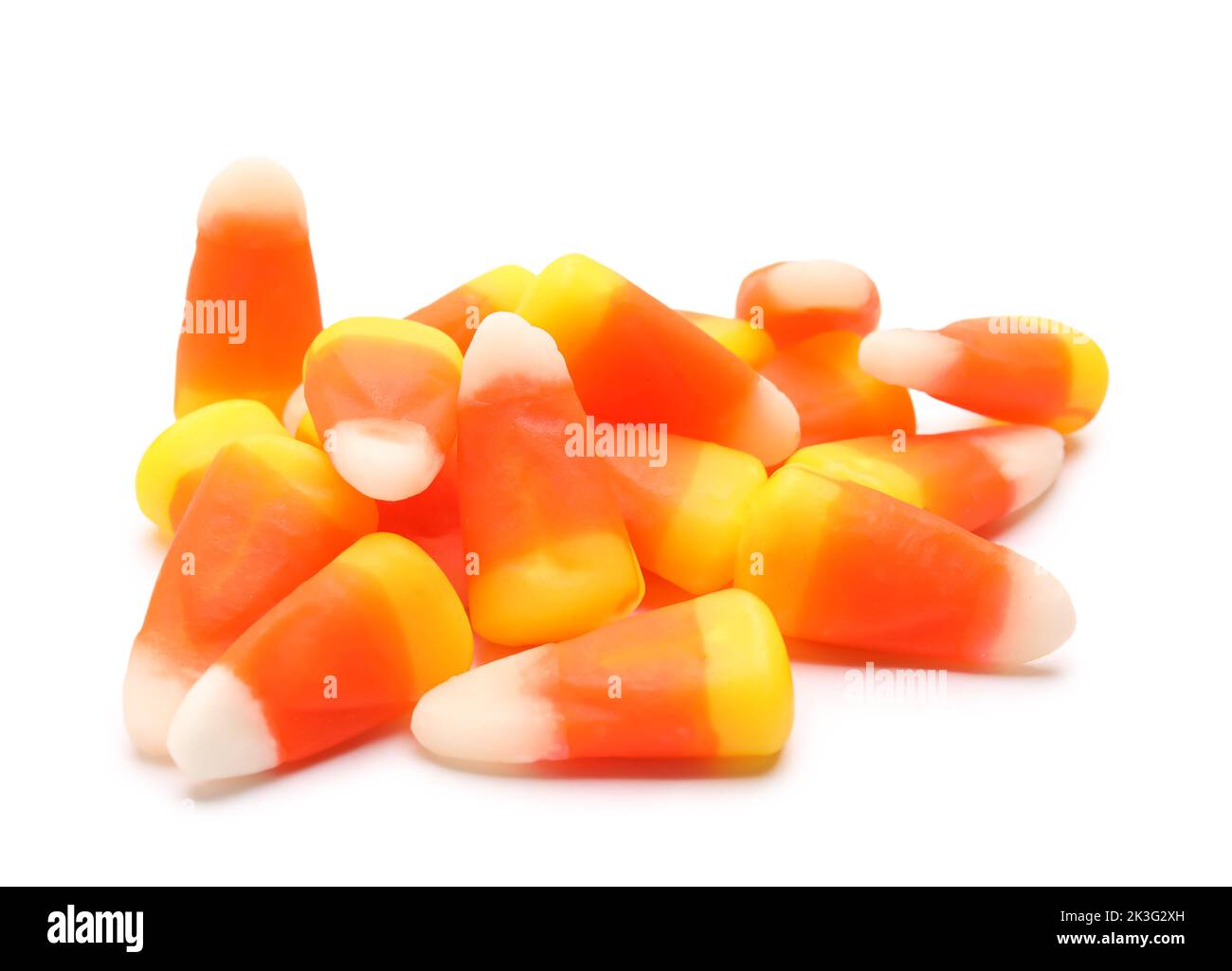 Halloween candy corns on white background Stock Photo - Alamy