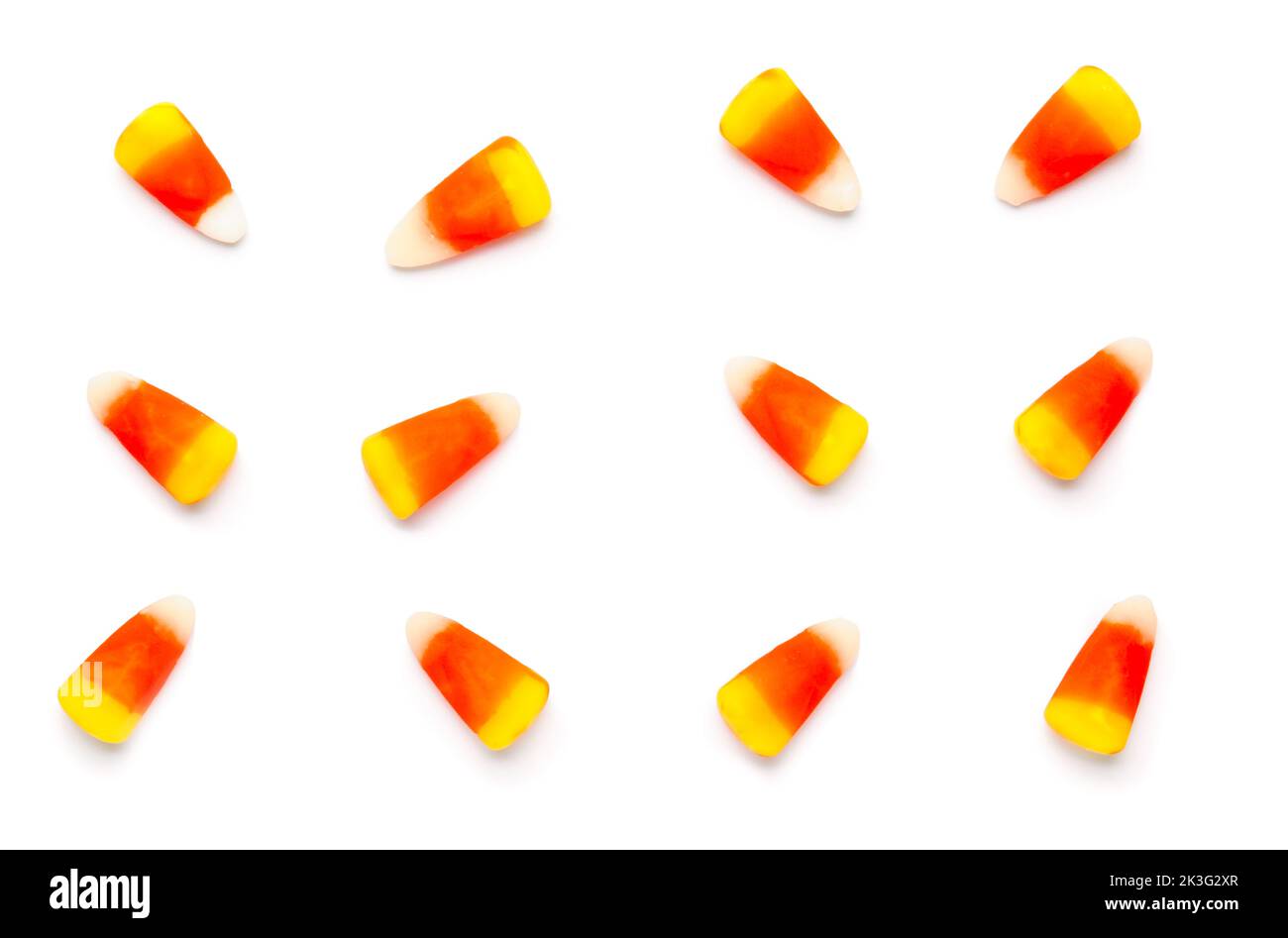 Halloween candy corns on white background Stock Photo - Alamy