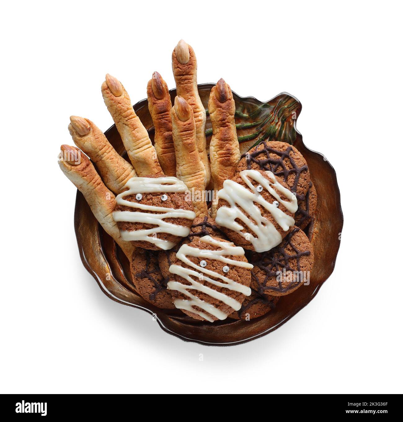 Plate with Halloween cookies on white background Stock Photo - Alamy