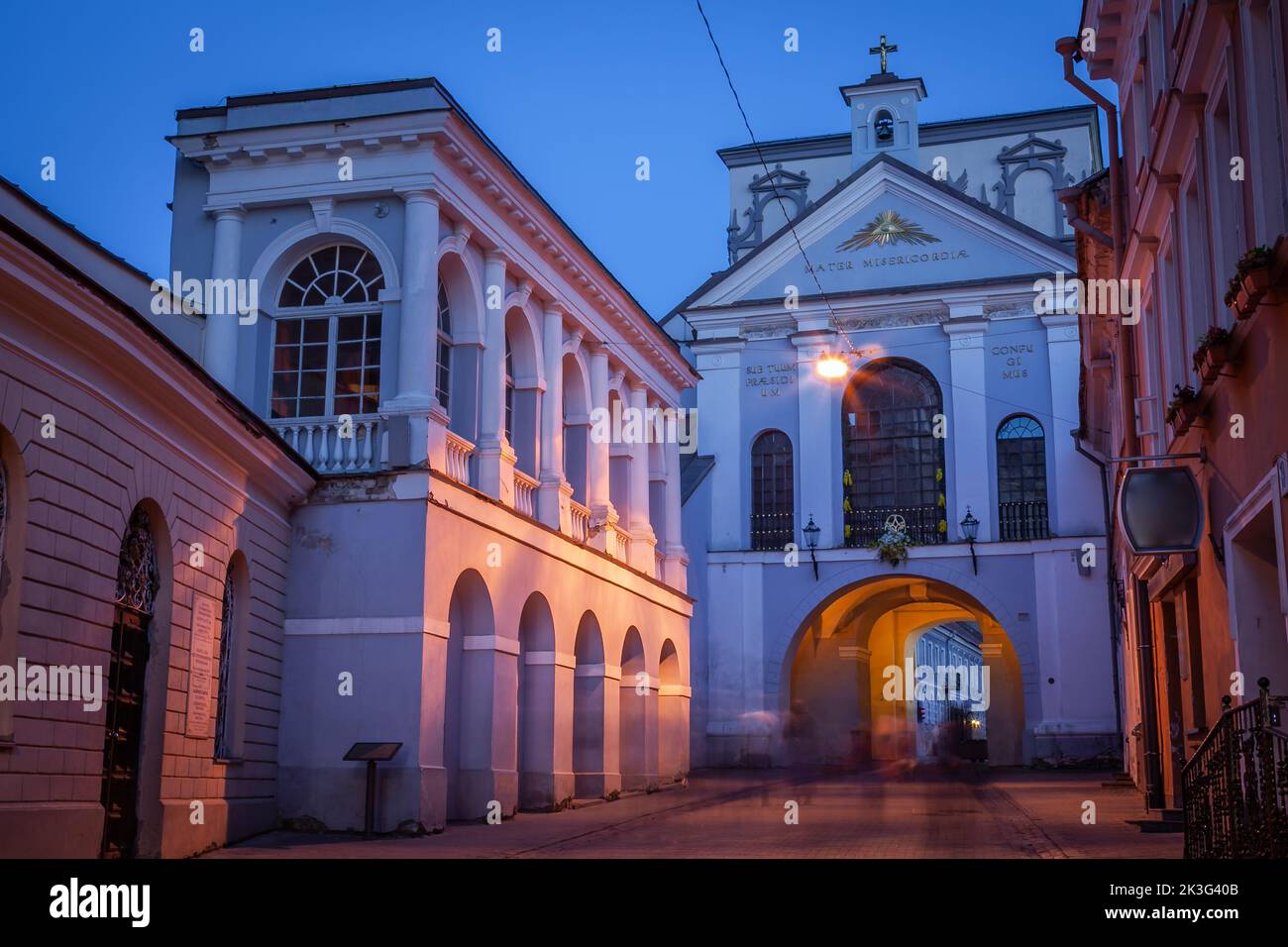 Vilnius old town, gates of dawn street illuminated at night, Lithuania ...