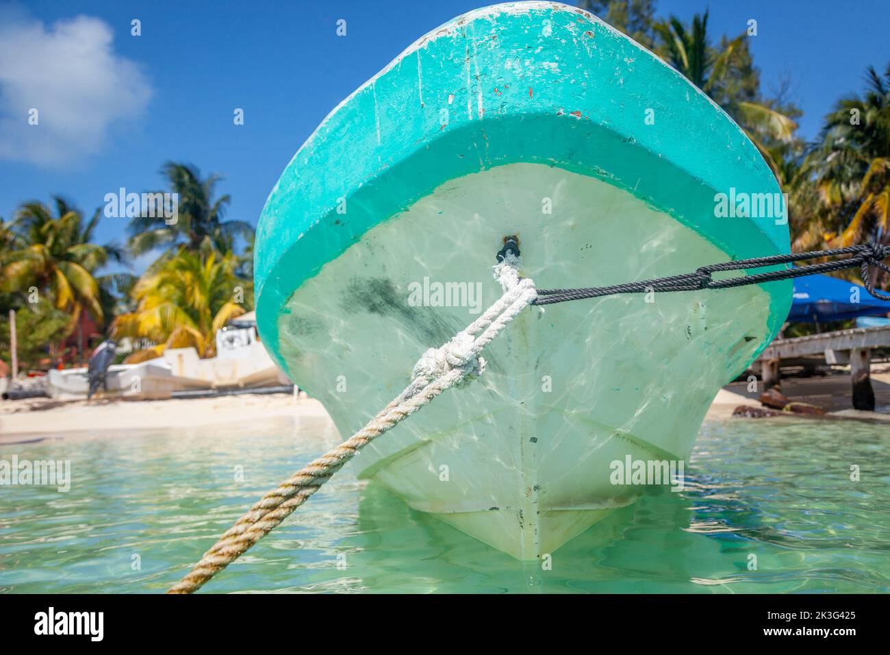 Cancun marina with rustic boat, caribbean beach at sunset, Riviera Maya ...