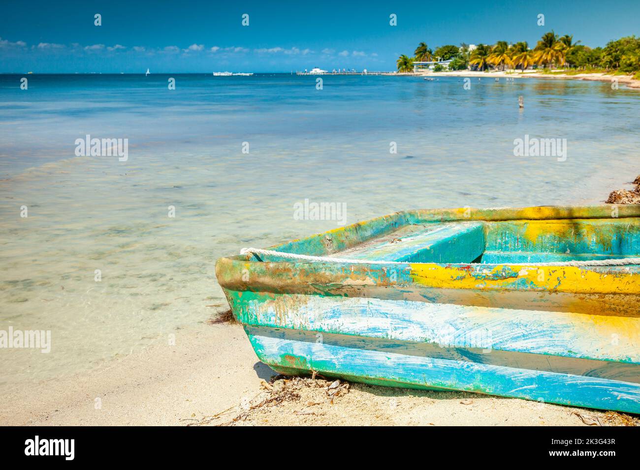 Cancun marina with rustic boat, caribbean beach at sunset, Riviera Maya ...