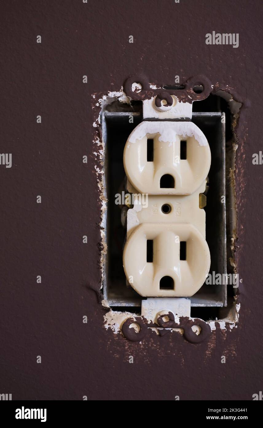 Close-up of electrical wall outlet inside home Stock Photo - Alamy