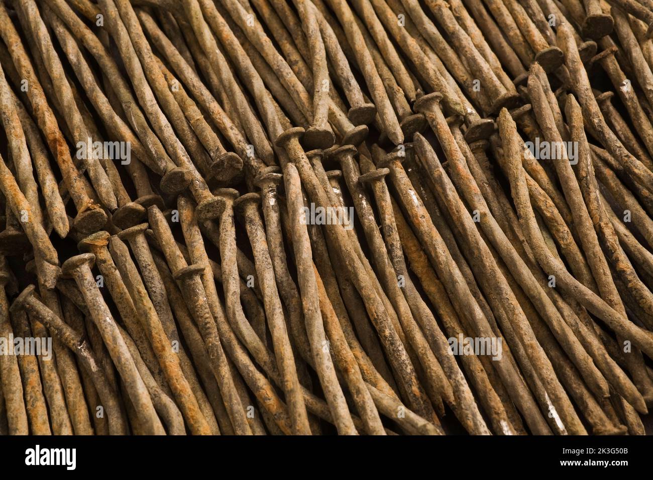 Old rusted steel spiral nails Stock Photo - Alamy
