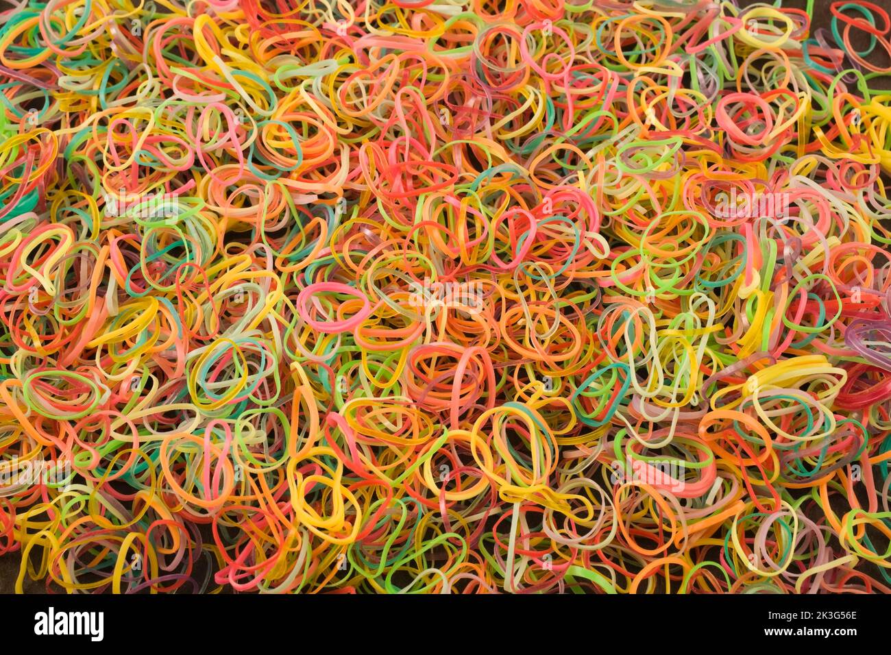 Assorted fluorescent colored rubber bands Stock Photo - Alamy