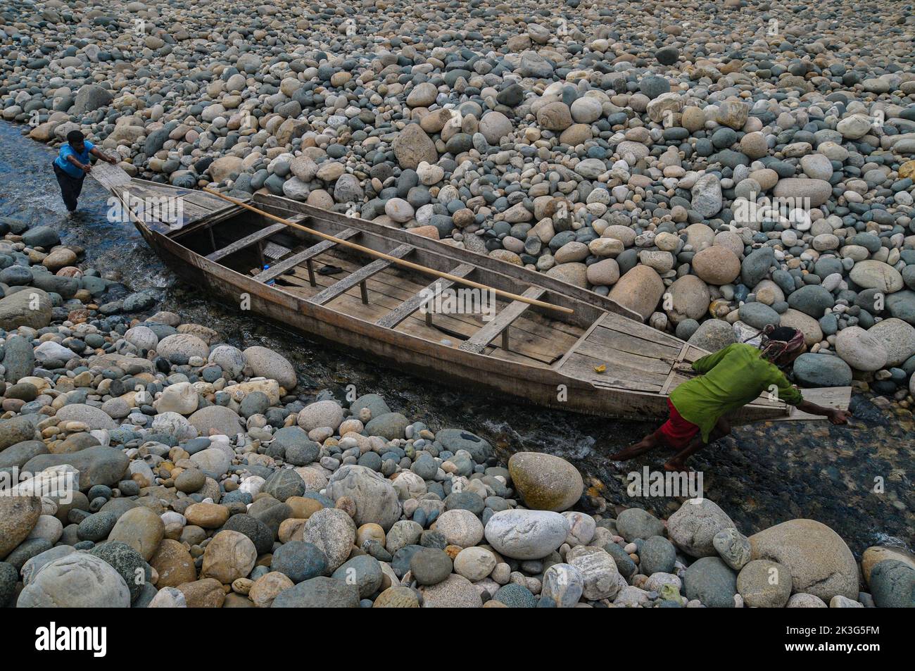 Sylhet, Bangladesh. 26th Sep, 2022. The sailor's boat is stuck in the ...