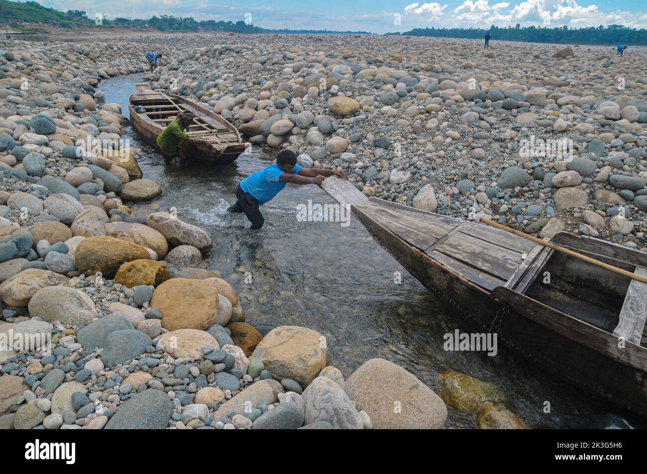Sylhet, Bangladesh. 26th Sep, 2022. The sailor's boat is stuck in the ...