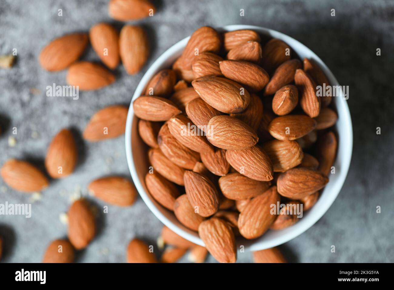 Almonds nuts top view - on white bowl, Delicious sweet almonds on the ...