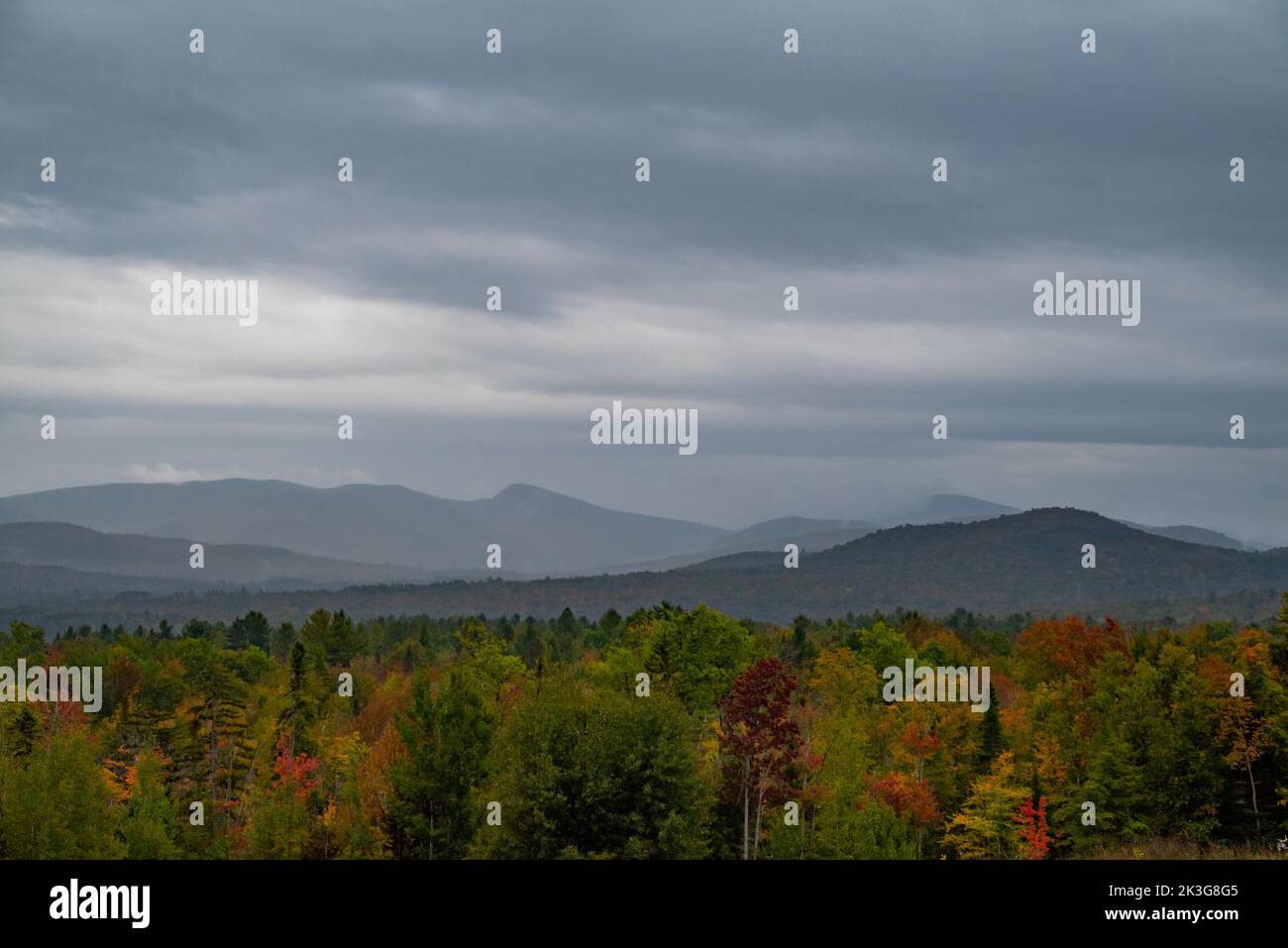 A scenic view Adirondack Mountains on a rainy afternoon with fall ...