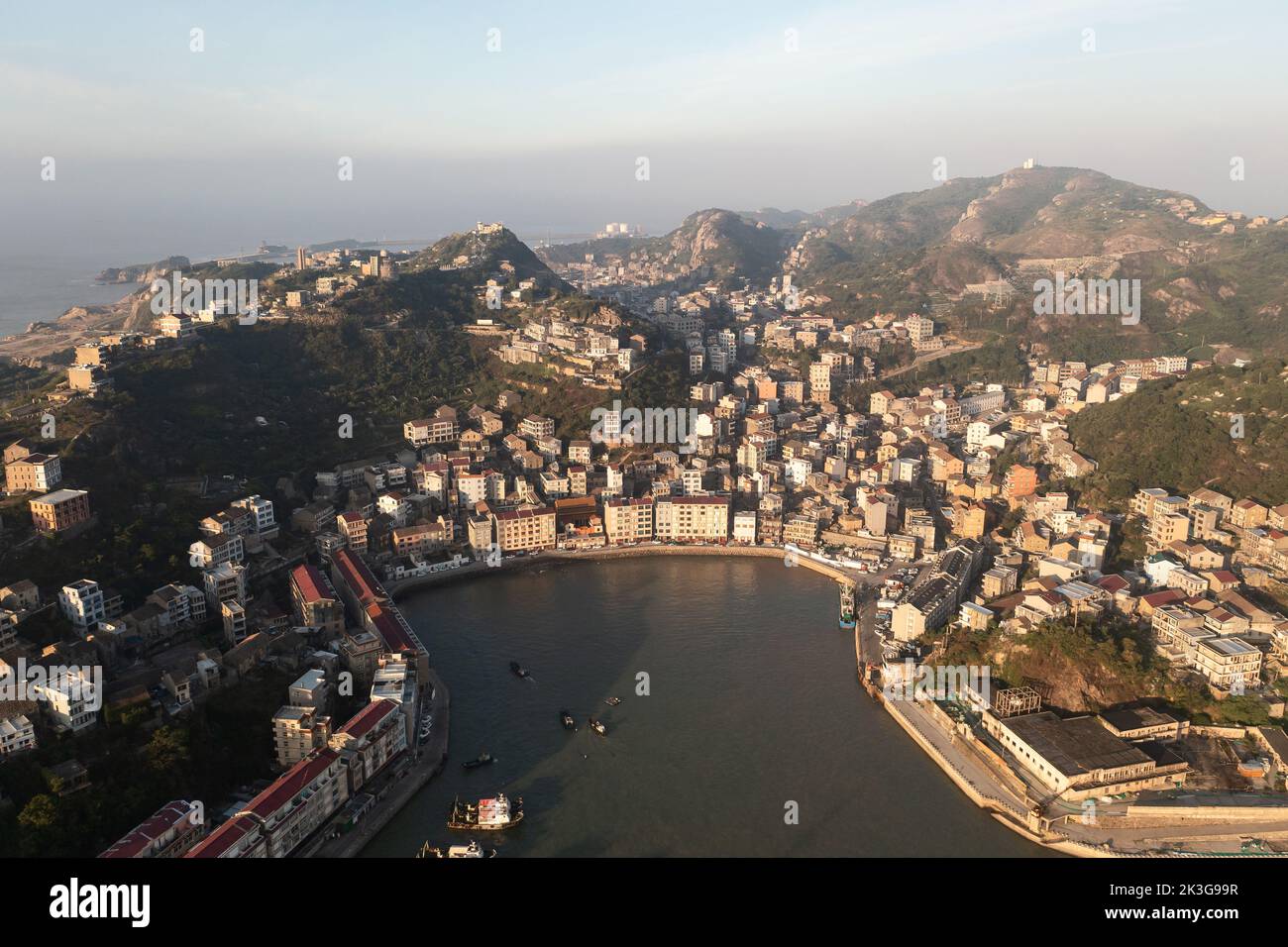 Seaside port with residental houses around, in Taizhou, Zhejiang, China ...