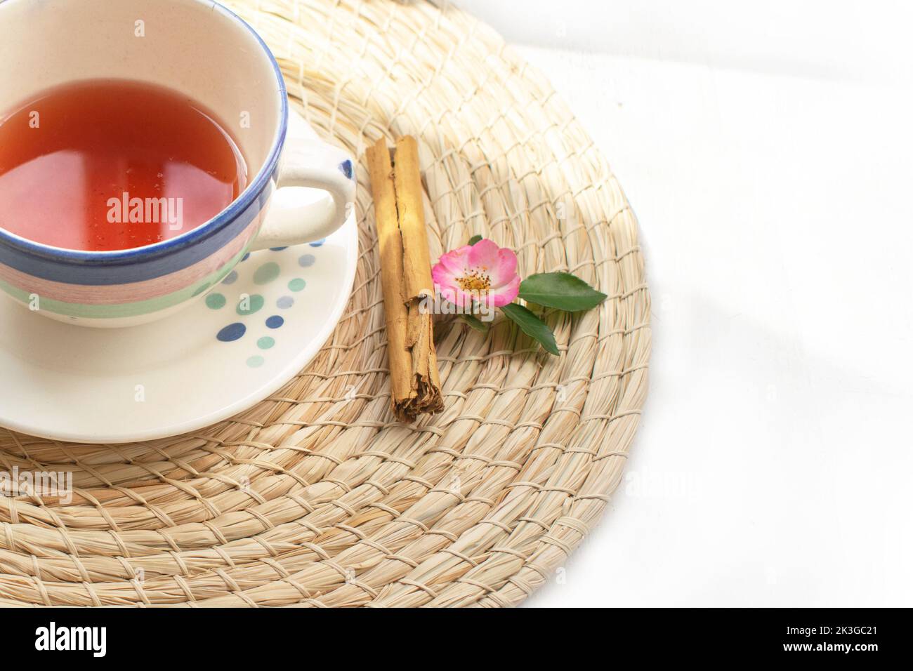 Aromatic or tea with cinnamon on individual natural fiber fabrics Stock ...