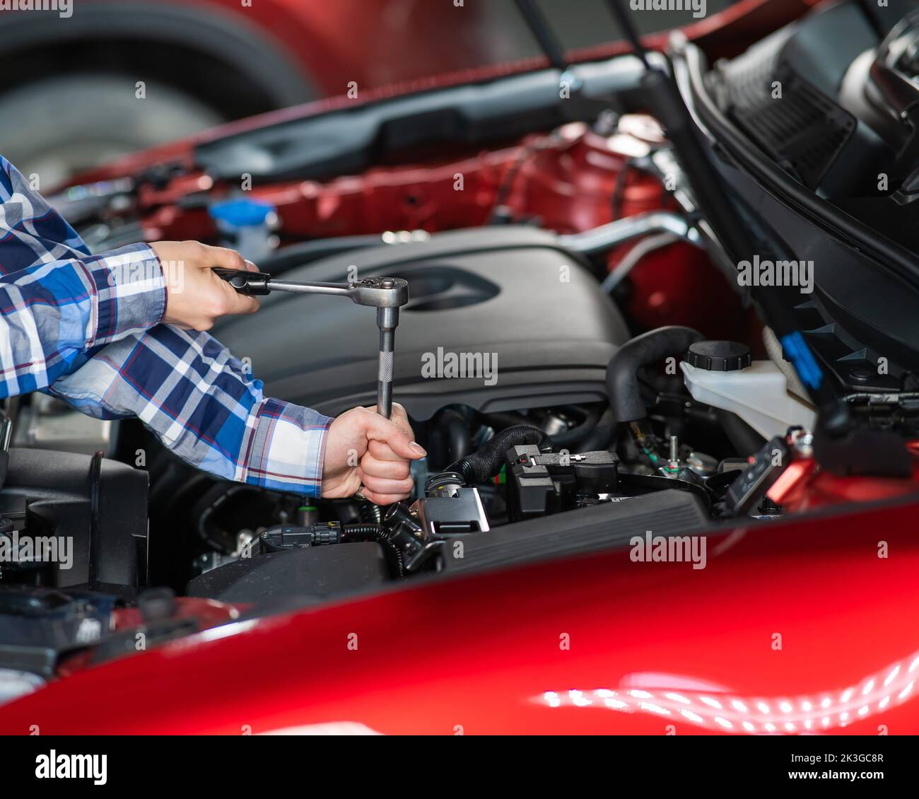 Mechanic unscrewing hi-res stock photography and images - Alamy