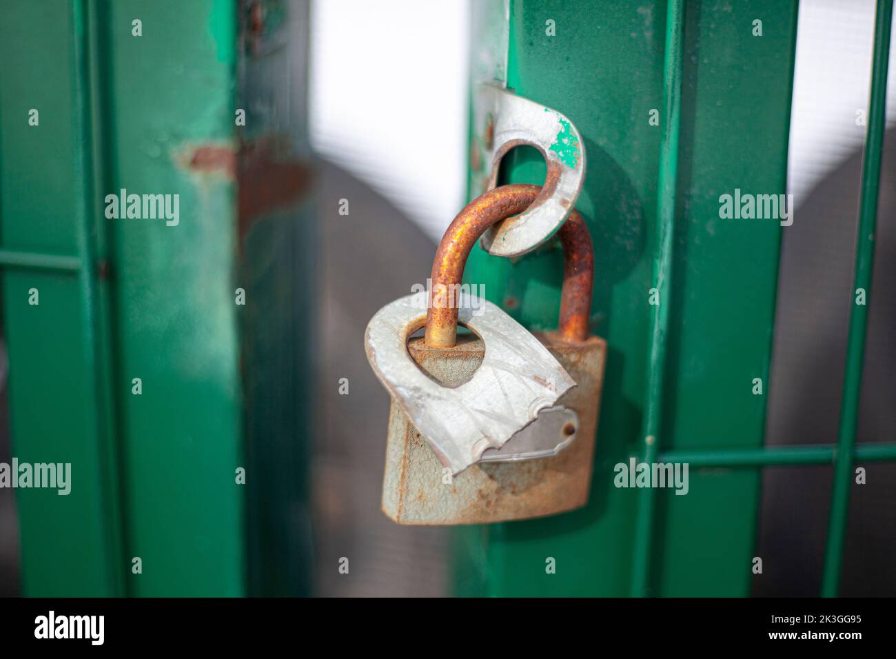 The castle hangs on the gate on the street. Closed door. Private ...