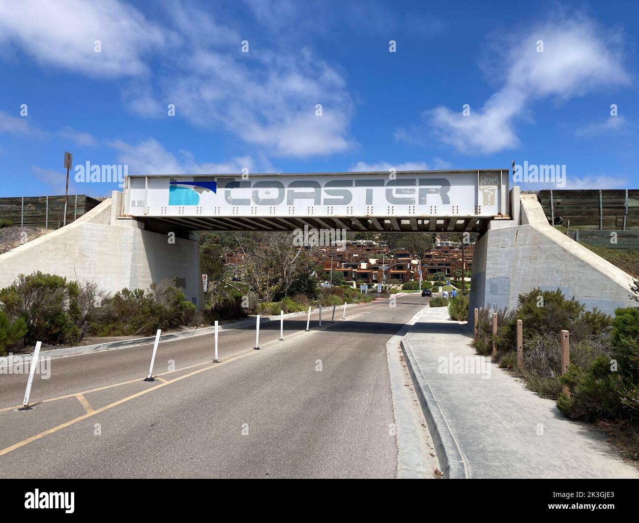 Coaster sign of a commuter rail service on rail the road bridge. - San ...
