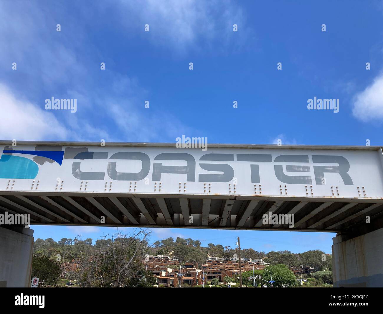 Coaster sign of a commuter rail service on rail the road bridge. - San ...