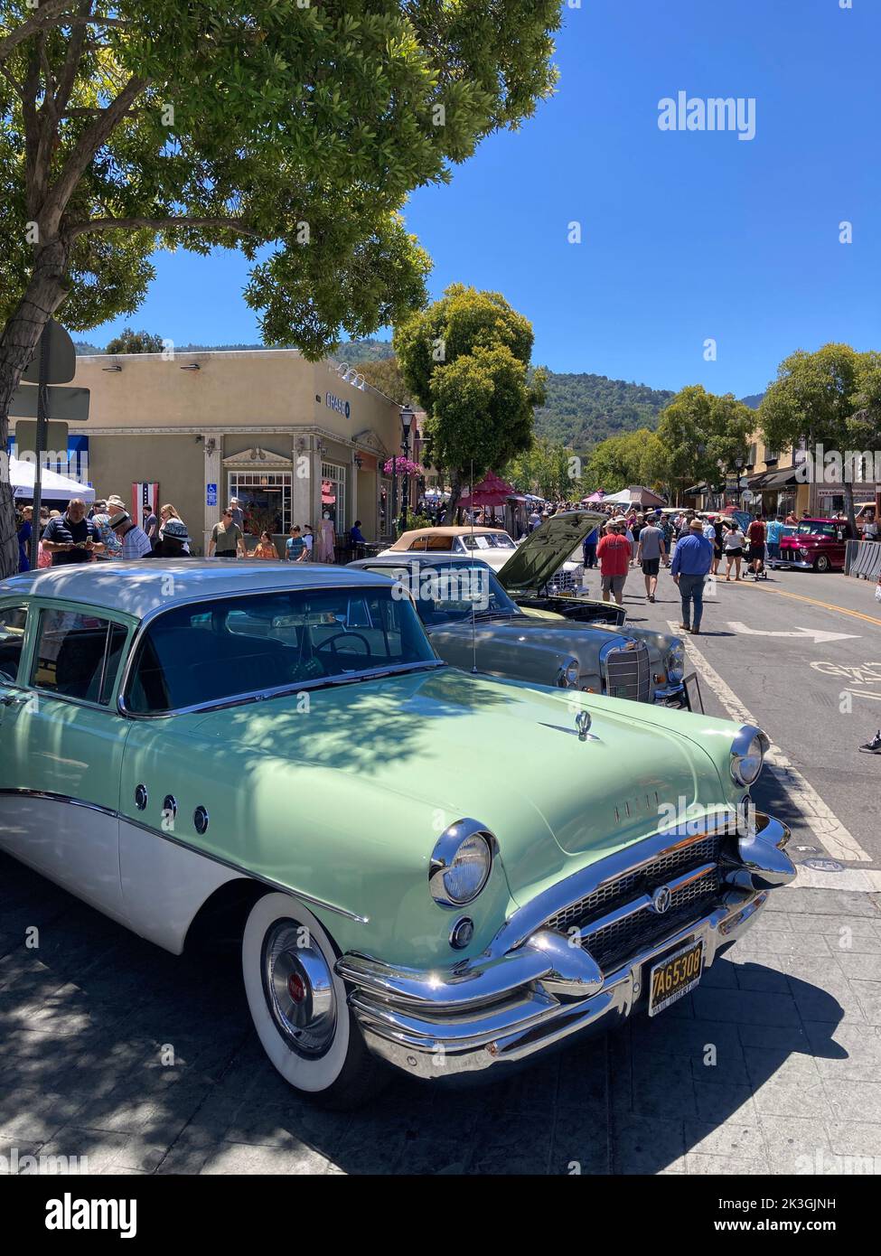 Colorful cars parked and displayed on the street during Classic and ...