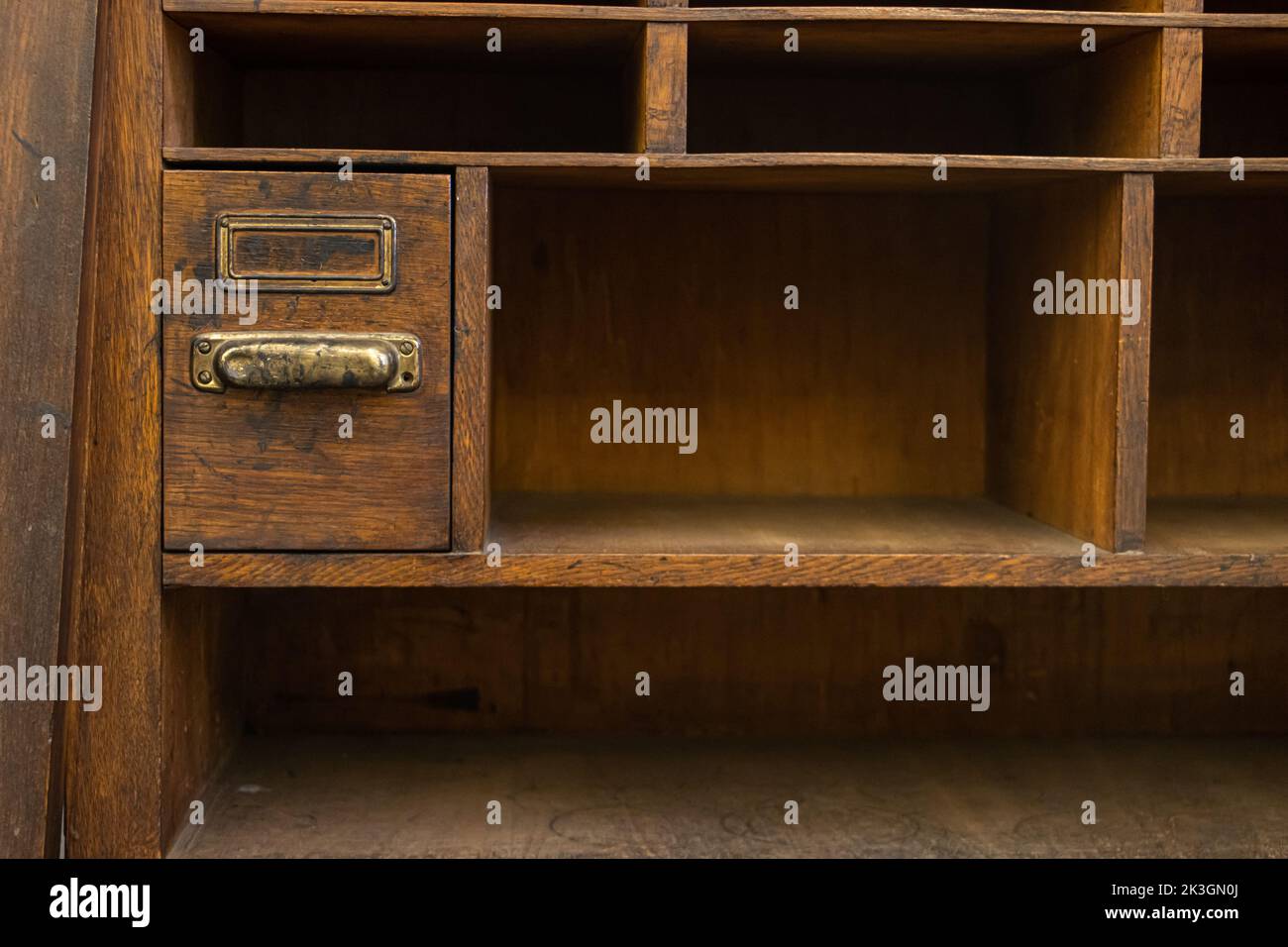 Old cabinet with shelves and drawer Stock Photo - Alamy