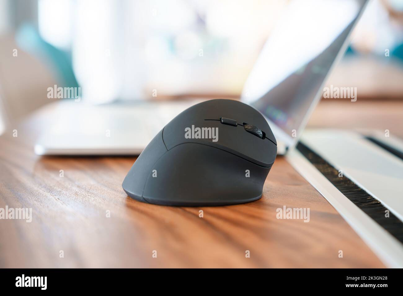 ergonomic mouse on desk at workplace, prevention wrist pain because ...