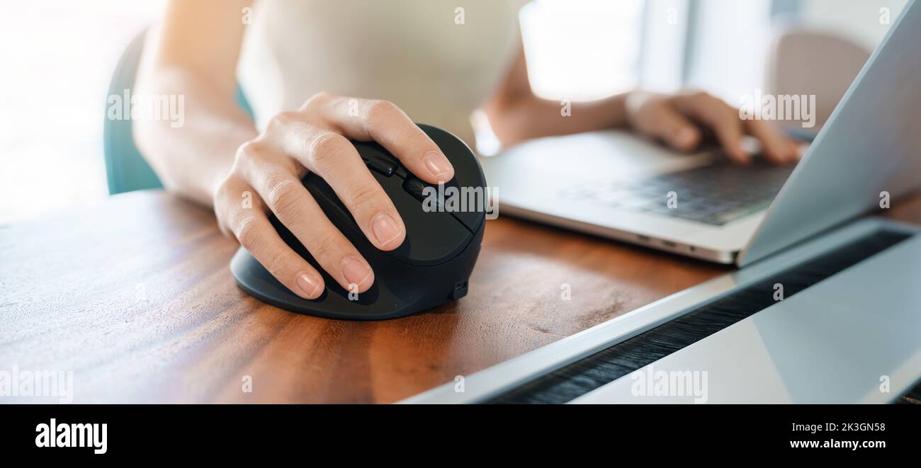 woman hand using computer ergonomic mouse, prevention wrist pain ...