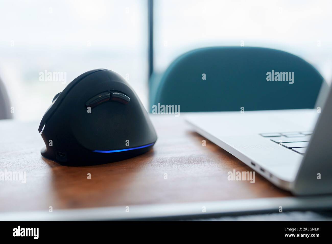 ergonomic mouse on desk at workplace, prevention wrist pain because ...
