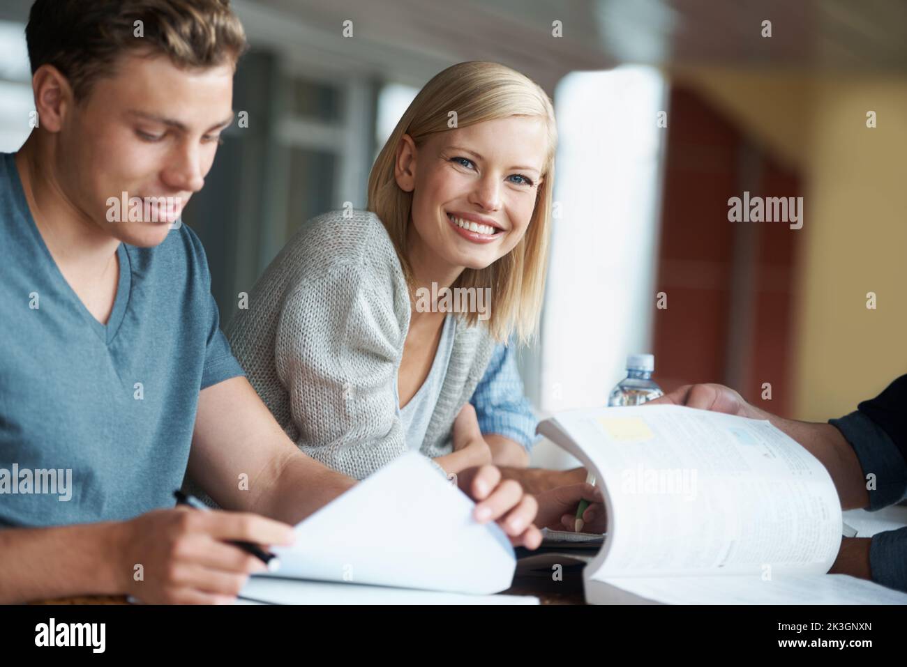 Im guaranteed to pass now. A young college student helping a friend ...