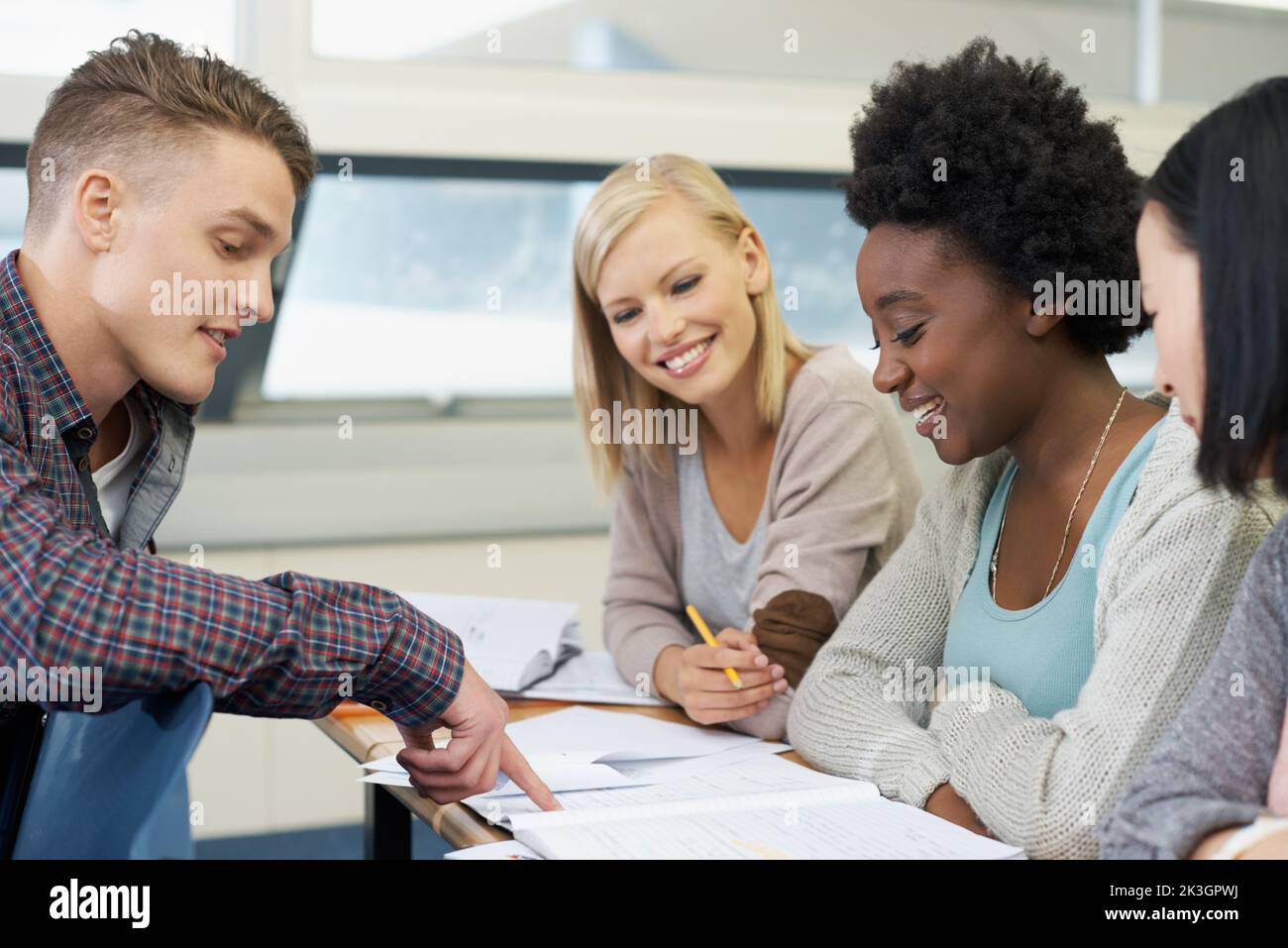 This problem is relatively simple...A group of college students sitting ...