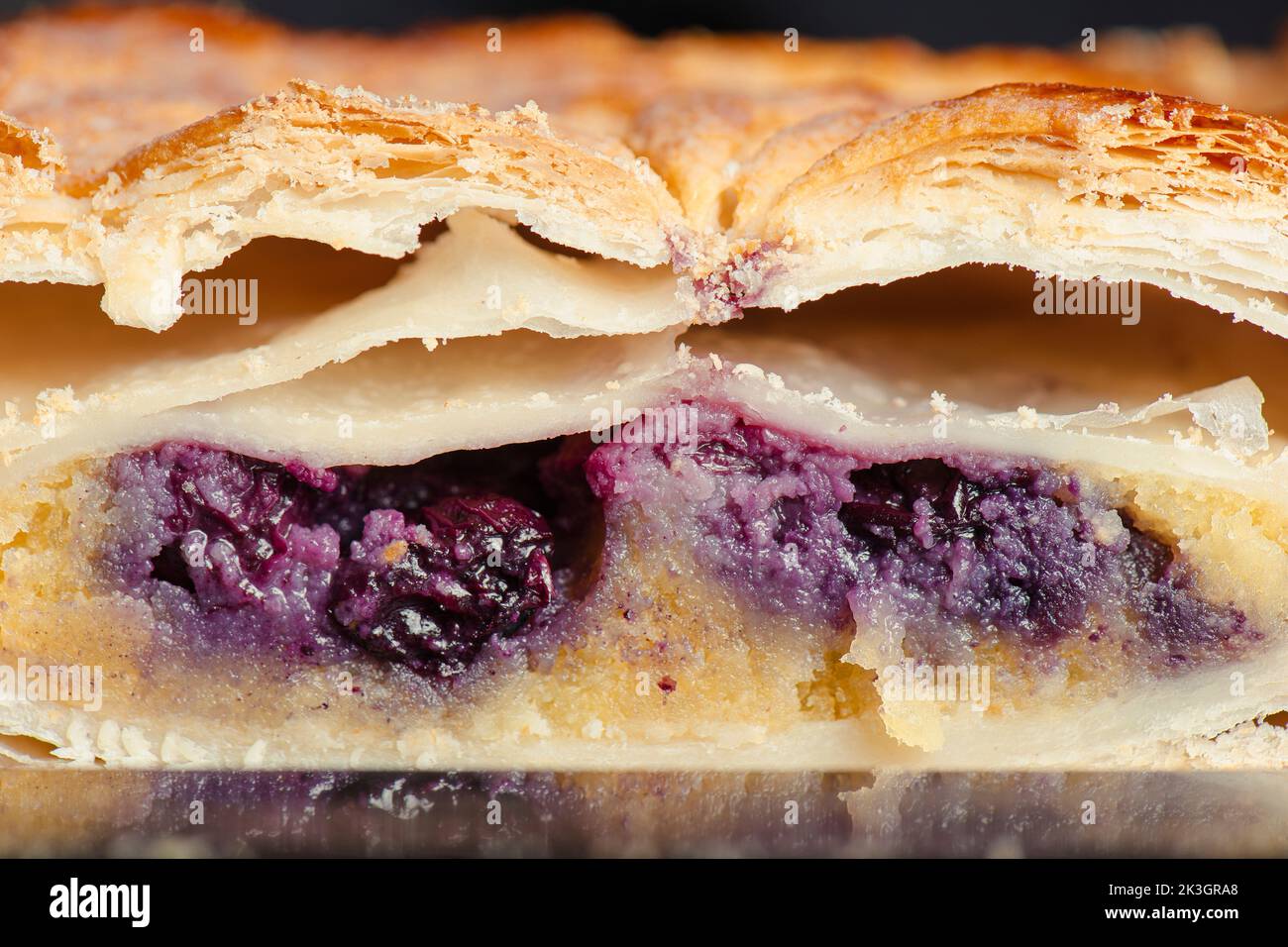 Freshly made and baked Pithivier with frangipane and blueberry Stock ...