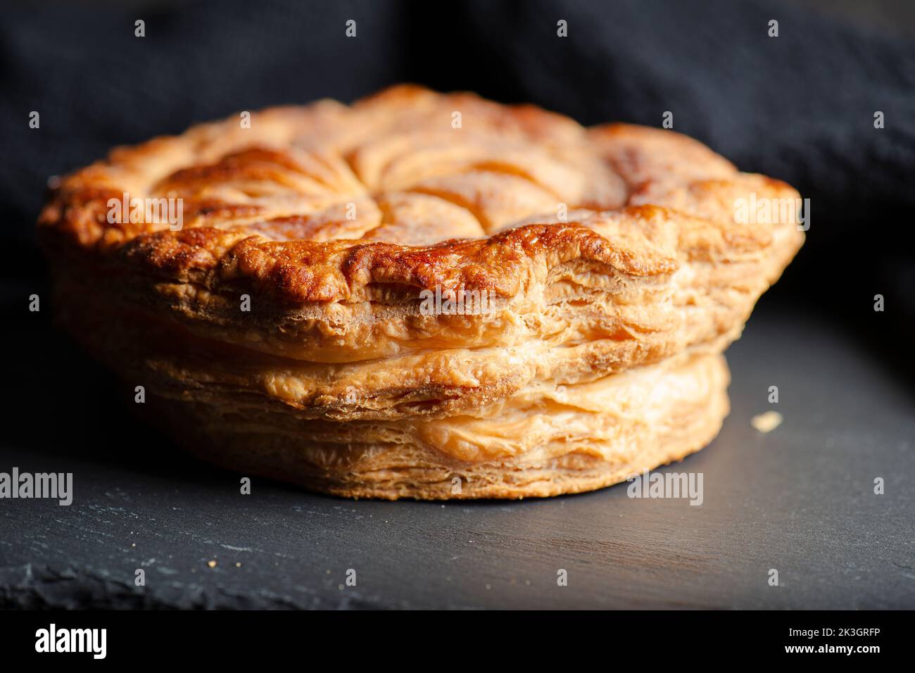 Freshly made and baked Pithivier with frangipane and blueberry Stock ...