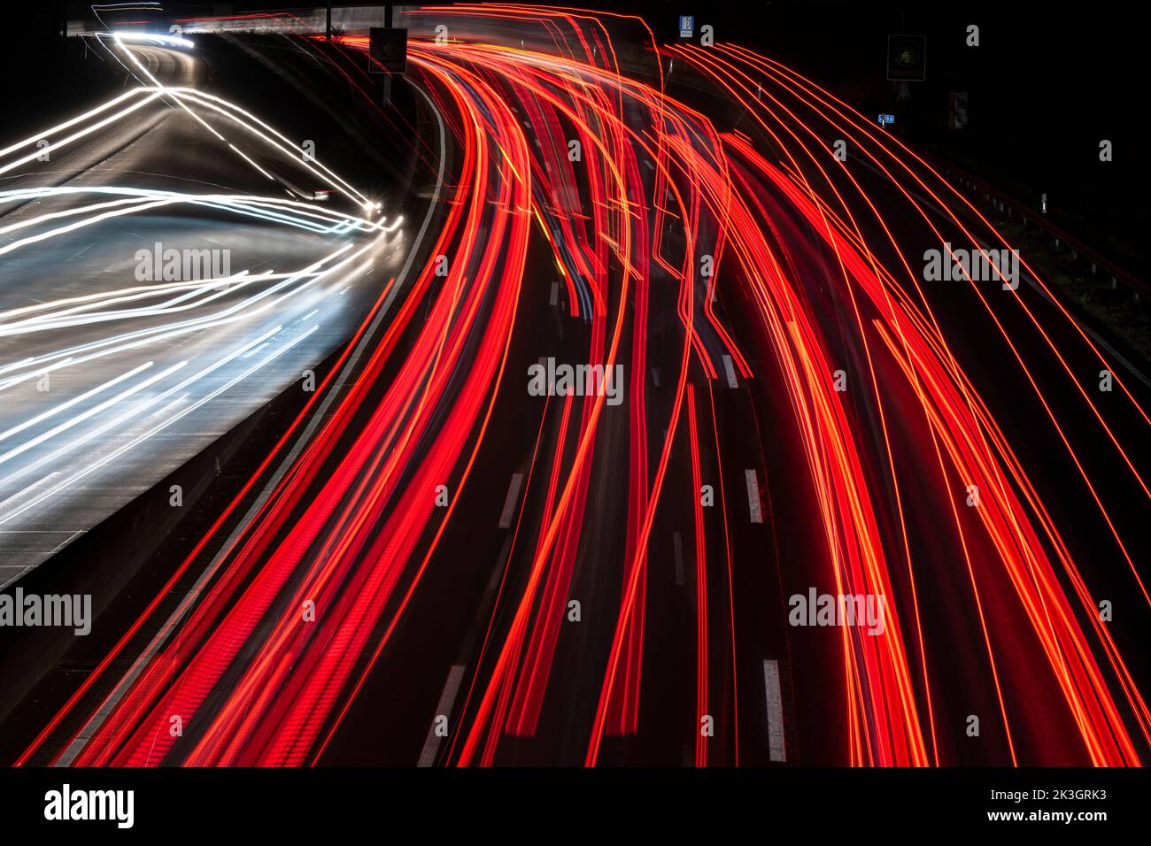 27 September 2022, Hessen, Frankfurt/Main: Passing cars trace their ...