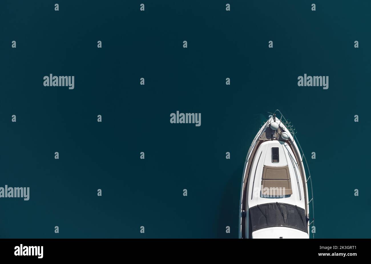 Aerial yacht on calm sea. Luxury cruise trip. View from above of white ...