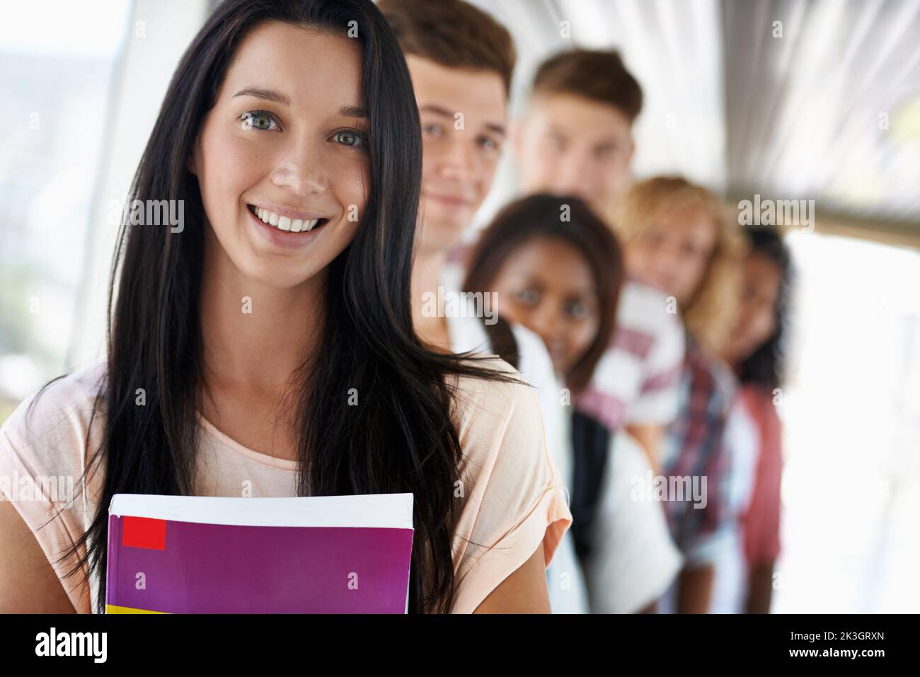 She loves university life. Portrait of a beautiful young college ...