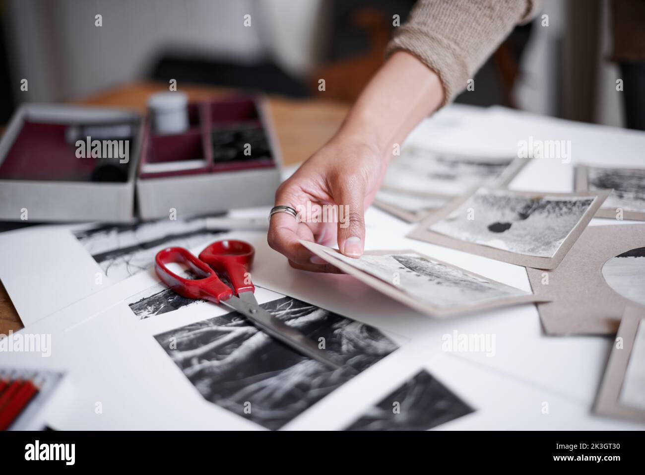 Working hard on her creative vision. A young woman working withe ...