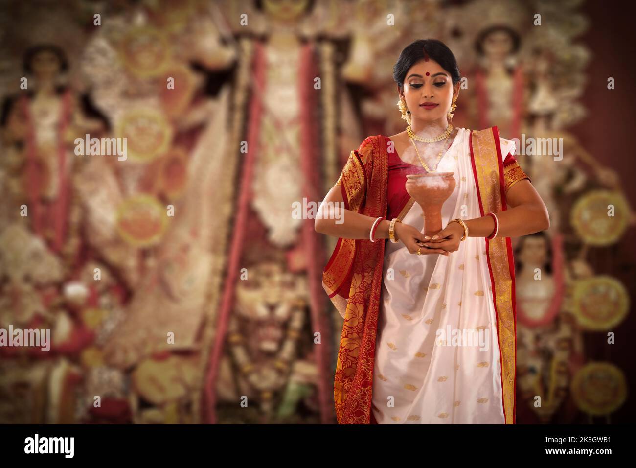 Portrait bengali woman holding dhunuchi hi-res stock photography and ...