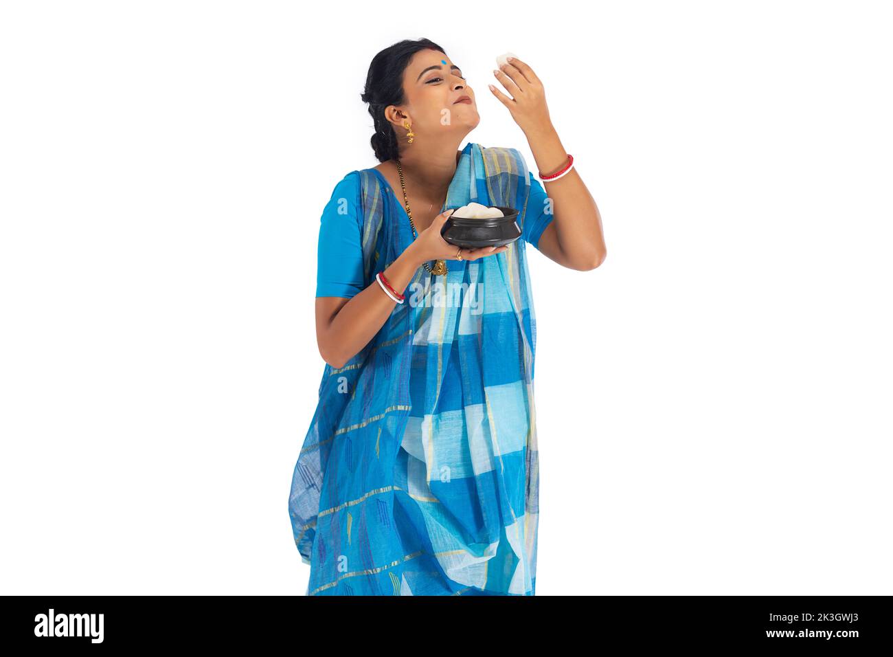 Portrait of Bengali woman having rosogolla Stock Photo - Alamy
