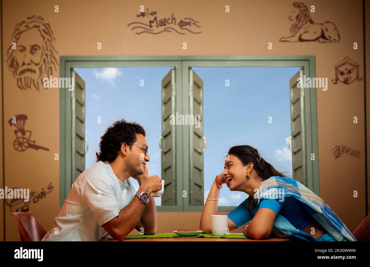 Portrait of Bengali couple having tea together in café Stock Photo - Alamy