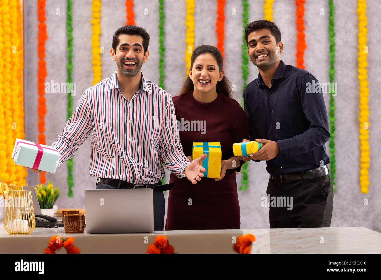 Employees celebrating Diwali together in office Stock Photo - Alamy