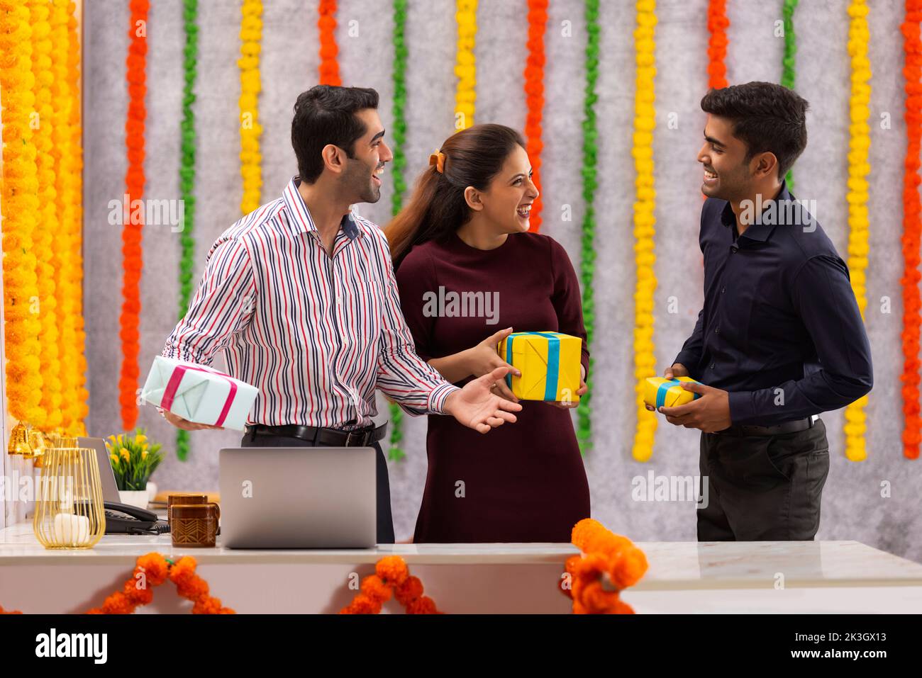 Employees celebrating Diwali together in office Stock Photo - Alamy