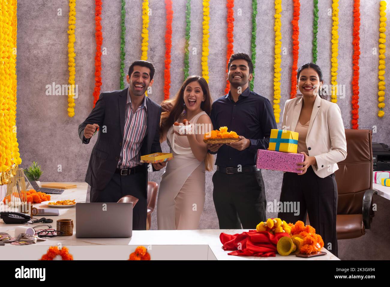 Employee celebrating Diwali together in office Stock Photo - Alamy